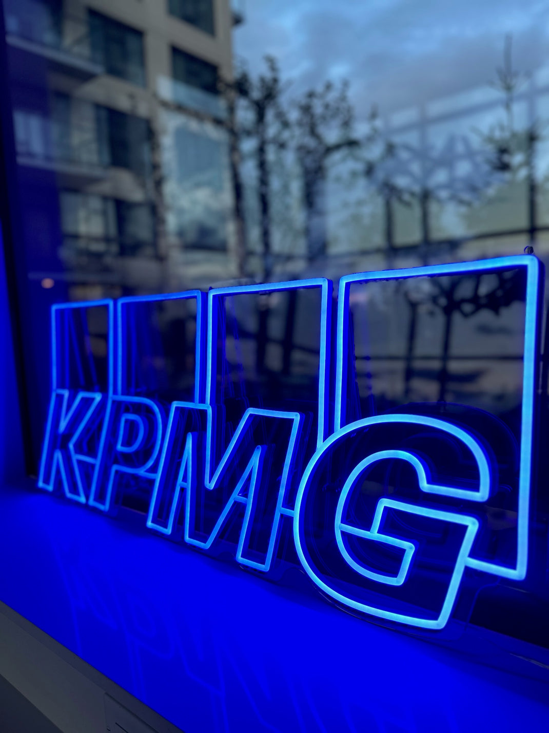 KPMG LED Neon Sign - Custom Logo Neon | Nightglow Studio