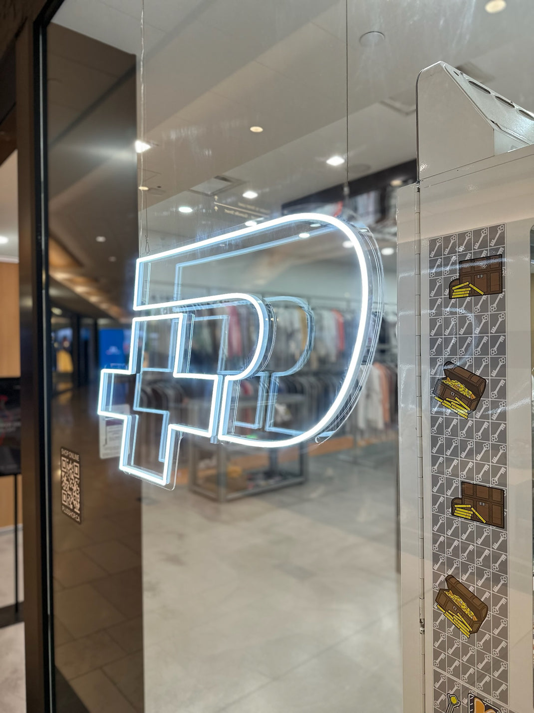 Modern Storefront Sign for Plus Shop – Nightglow Studio